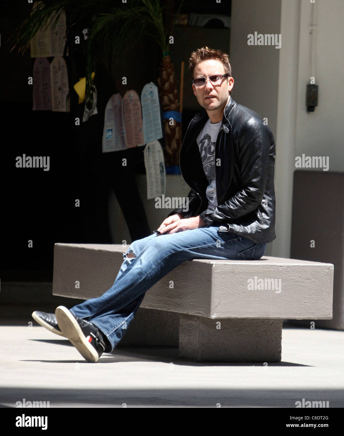 Michael Rosenbaum takes a break while running errands in West Hollywood ...