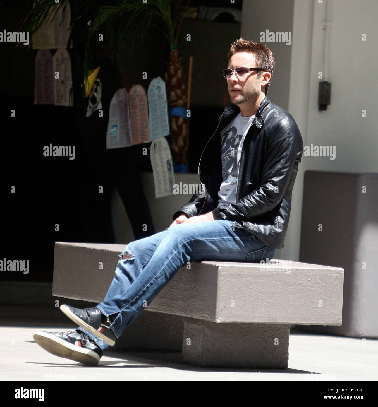 Michael Rosenbaum takes a break while running errands in West Hollywood ...