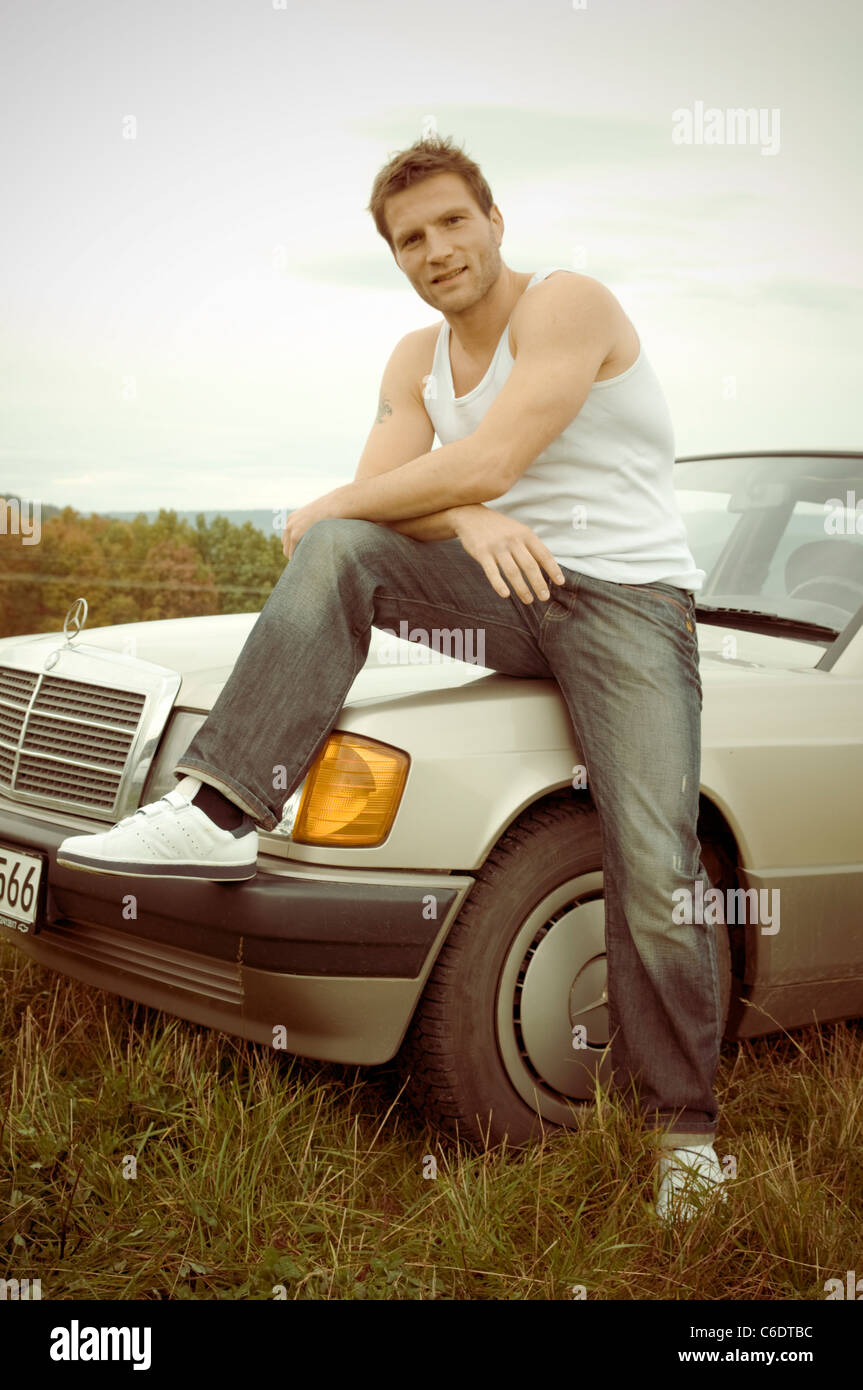 Man with Mercedes car in an Eighties look Stock Photo - Alamy