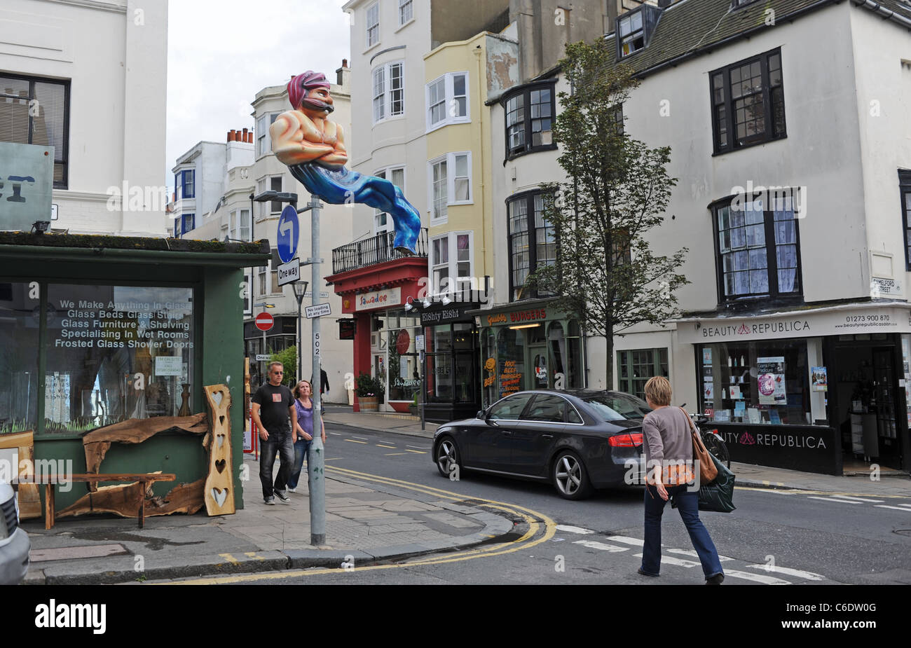 This large genie like character is keeping an eye on things down St ...