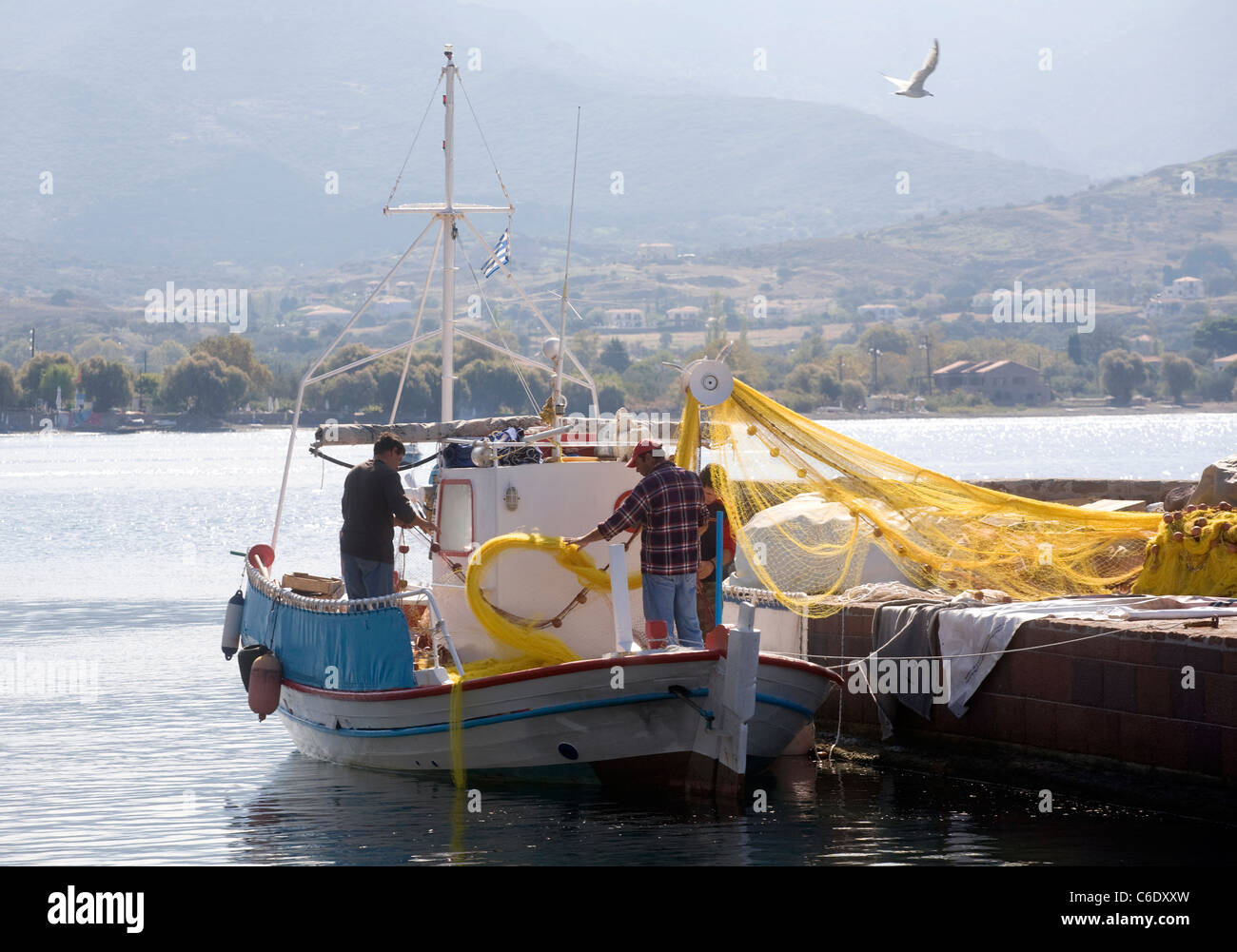 Island greece people fishermen hi-res stock photography and images - Alamy