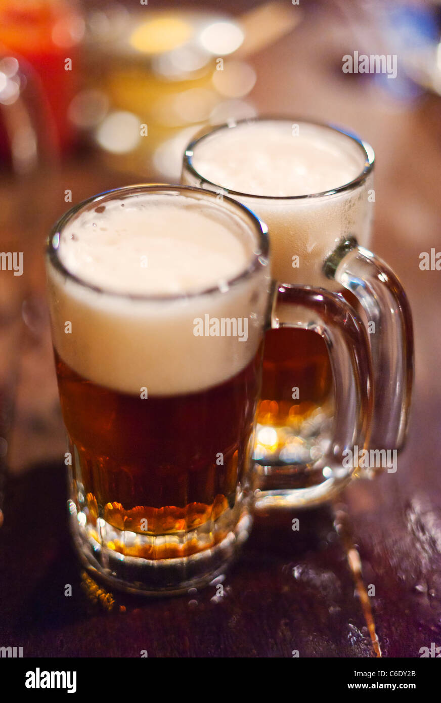 USA, New York, New York City, Two beers on bar Stock Photo - Alamy