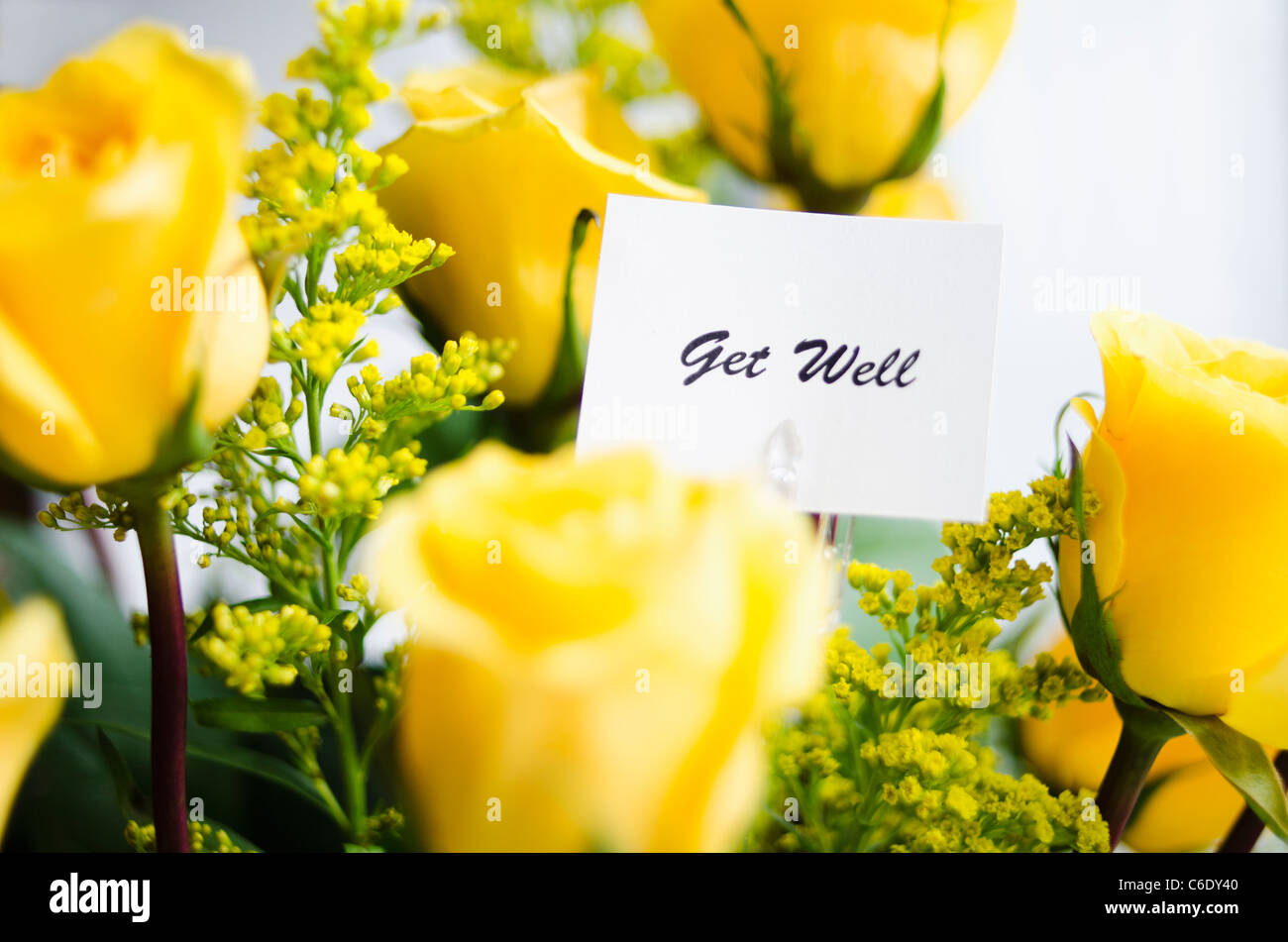Get well card on bouquet of roses Stock Photo - Alamy