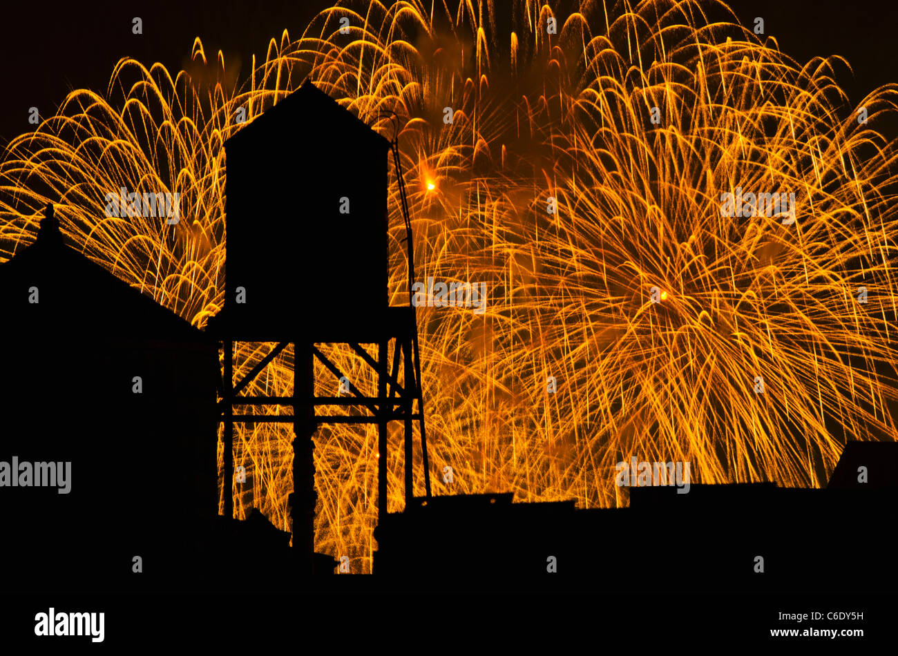 USA, New York, New York City, Fourth of july fireworks over buildings ...