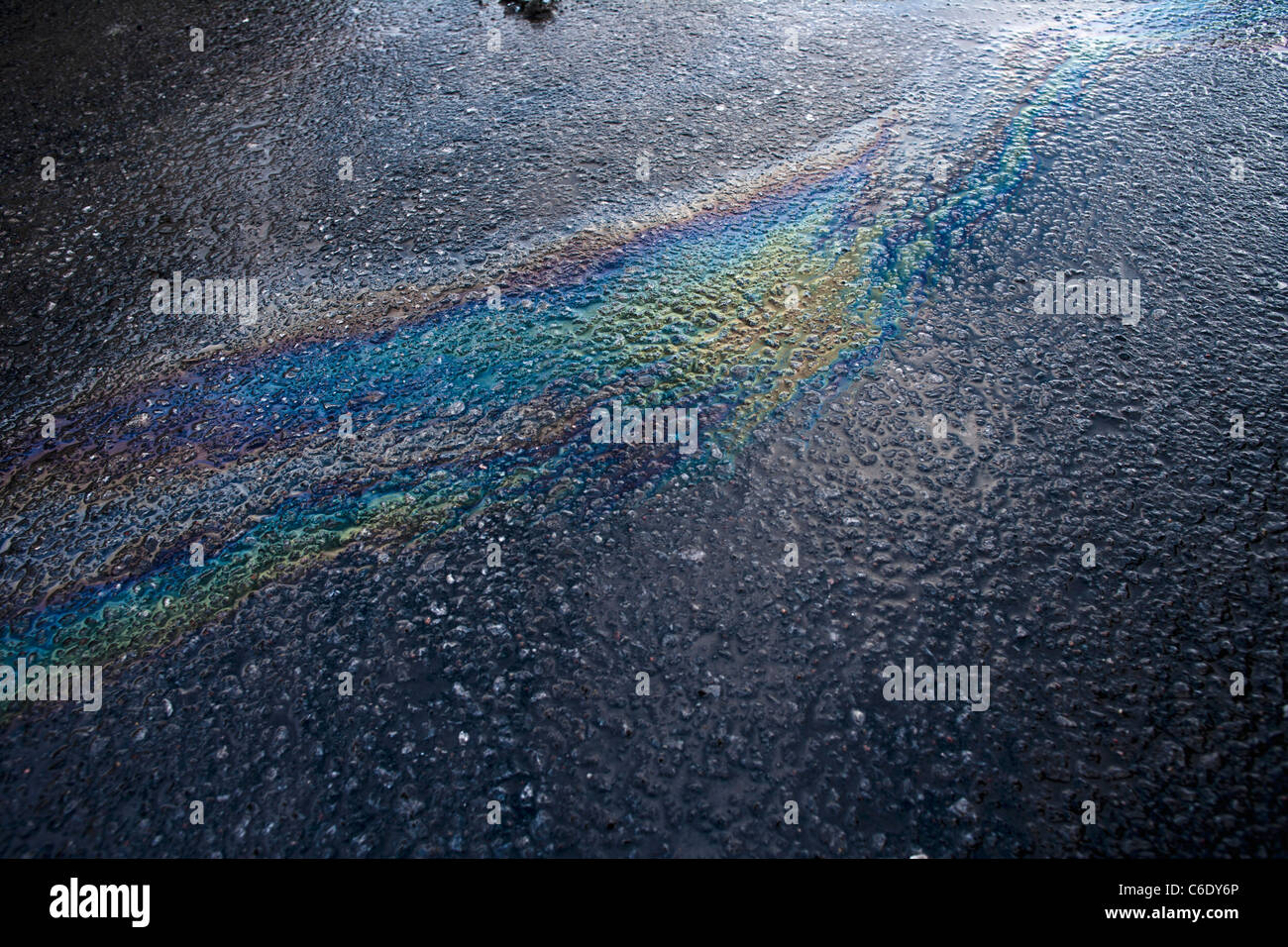 Oil Slick in a parking lot Stock Photo - Alamy