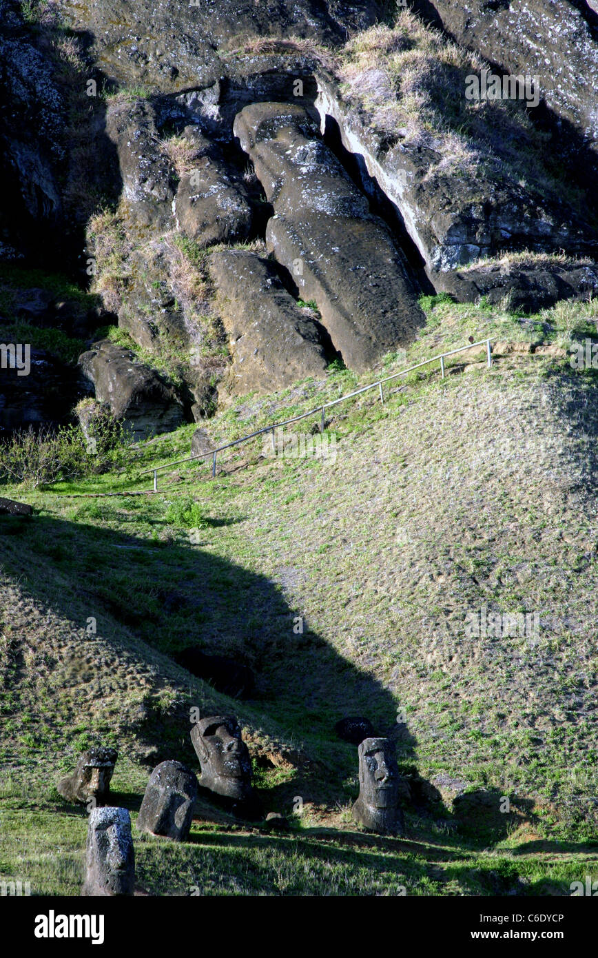 Buried & unfinished moai statues at the quarry Ranu Raraku. Rapa Nui ...