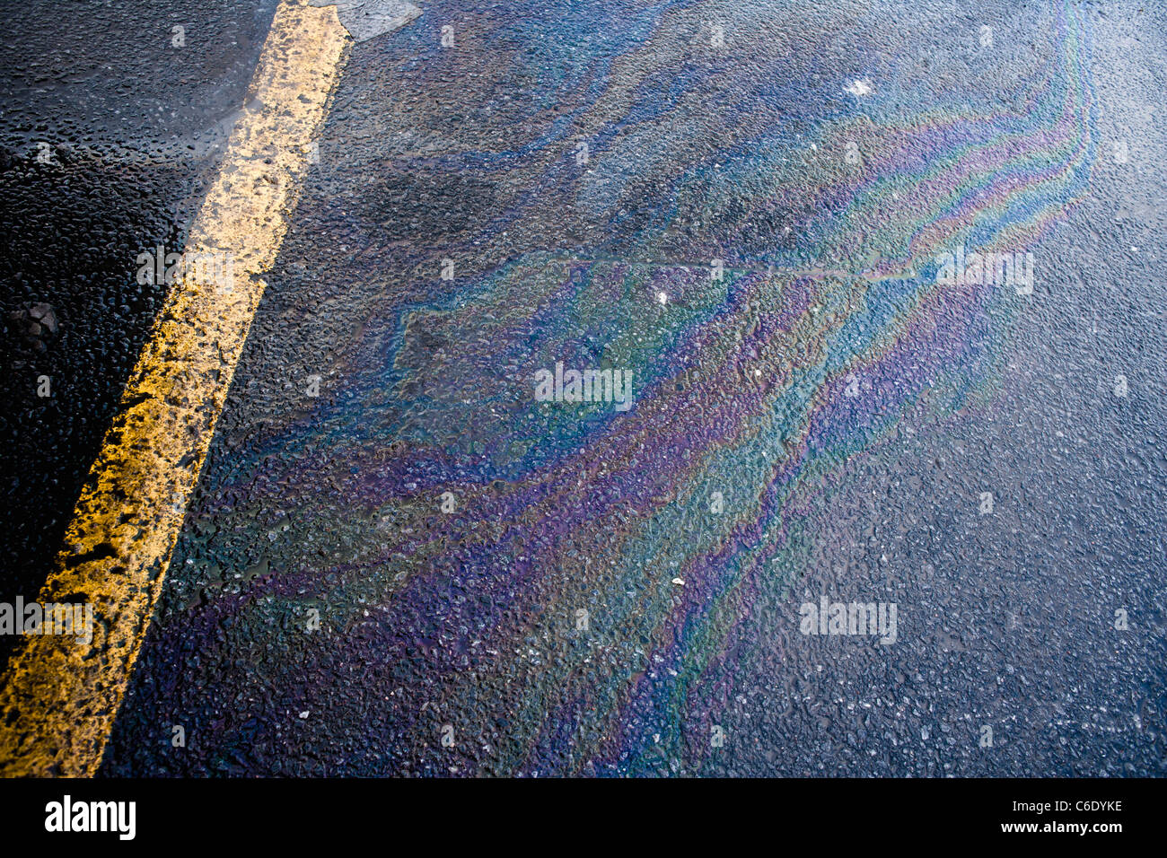 Oil Slick in a parking lot Stock Photo - Alamy