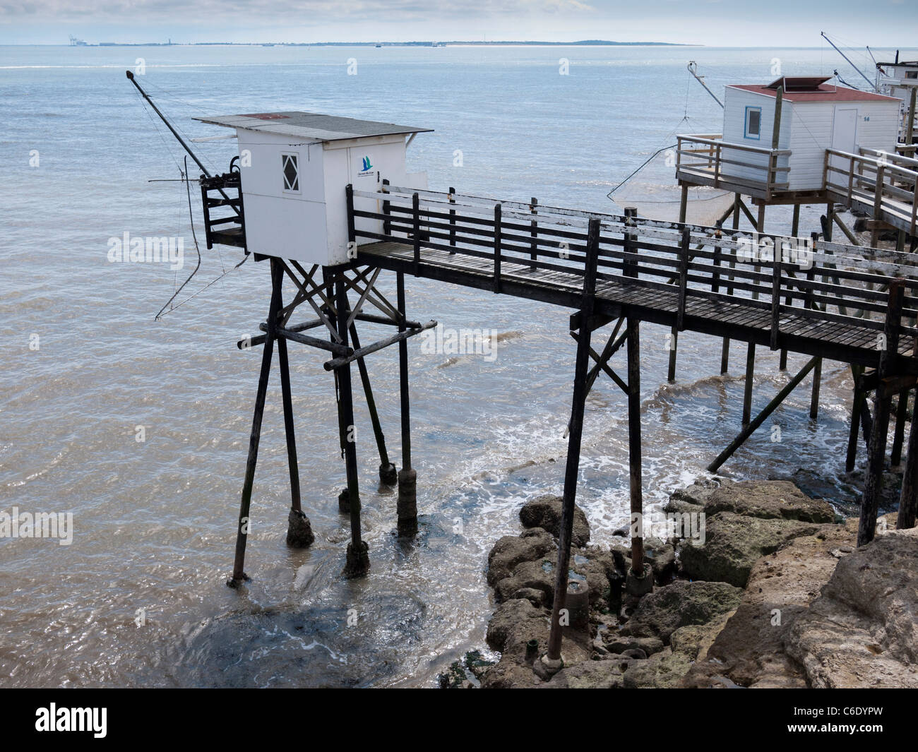 Fishermens hut with suspended nets, carrelets, on the Gironde Estuary ...