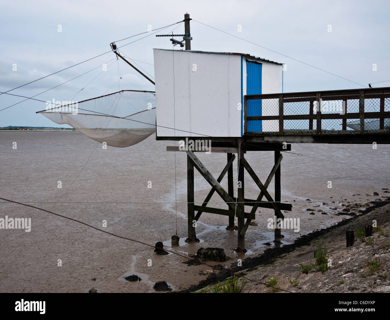 Fishermens hut with suspended nets, carrelets, on the Gironde Estuary ...