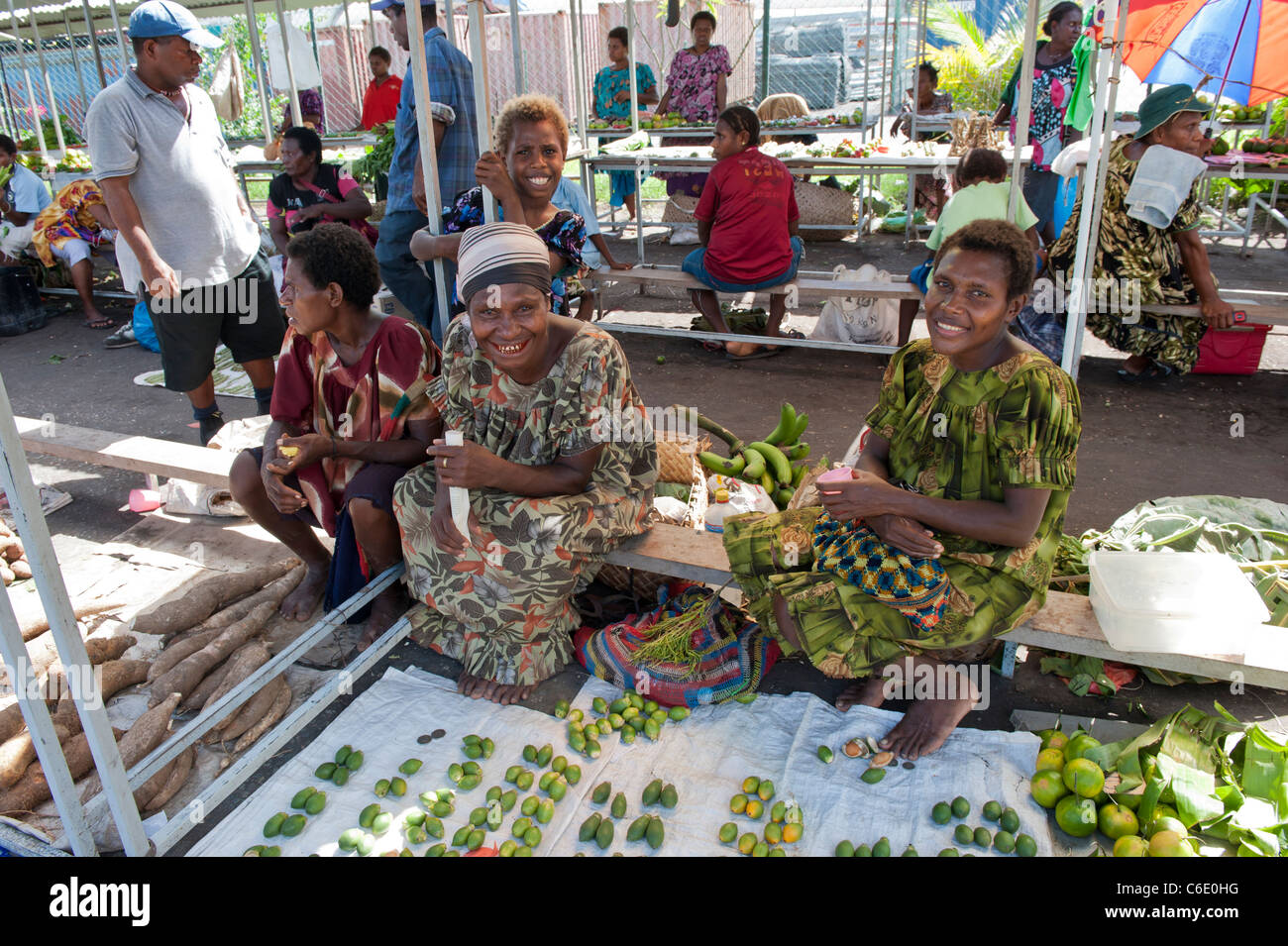 Market scene in Rabaul Town with Ladies selling Areca or Betal Nuts and ...