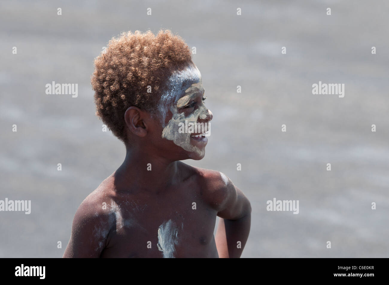 Local Children with Traditional face Paint Play near the Ash and Lava ...