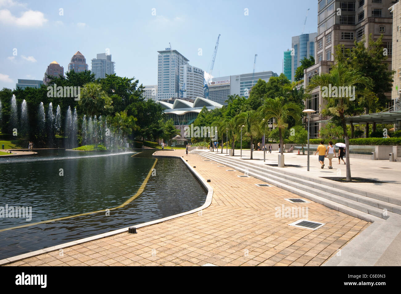 KLCC Park at the Petronas Twin Towers in front of the skyline with ...