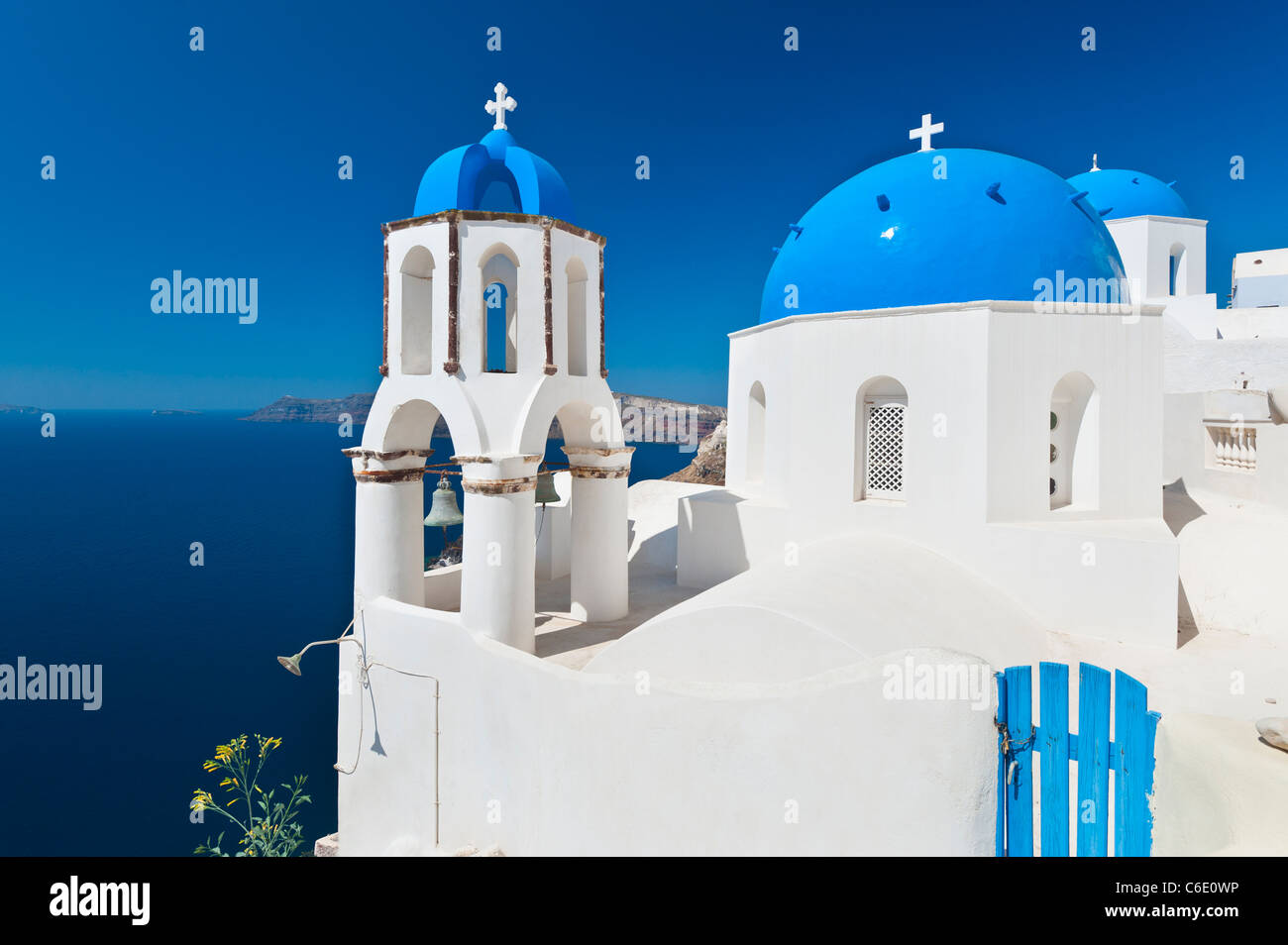 Greece, Cyclades Islands, Santorini, Oia, Church with bell tower at ...