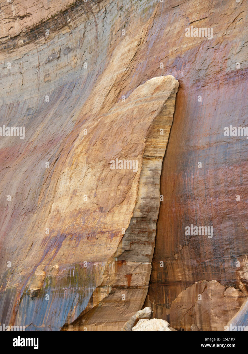 Michigan's Pictured Rocks has streaks on the face of the cliffs that ...
