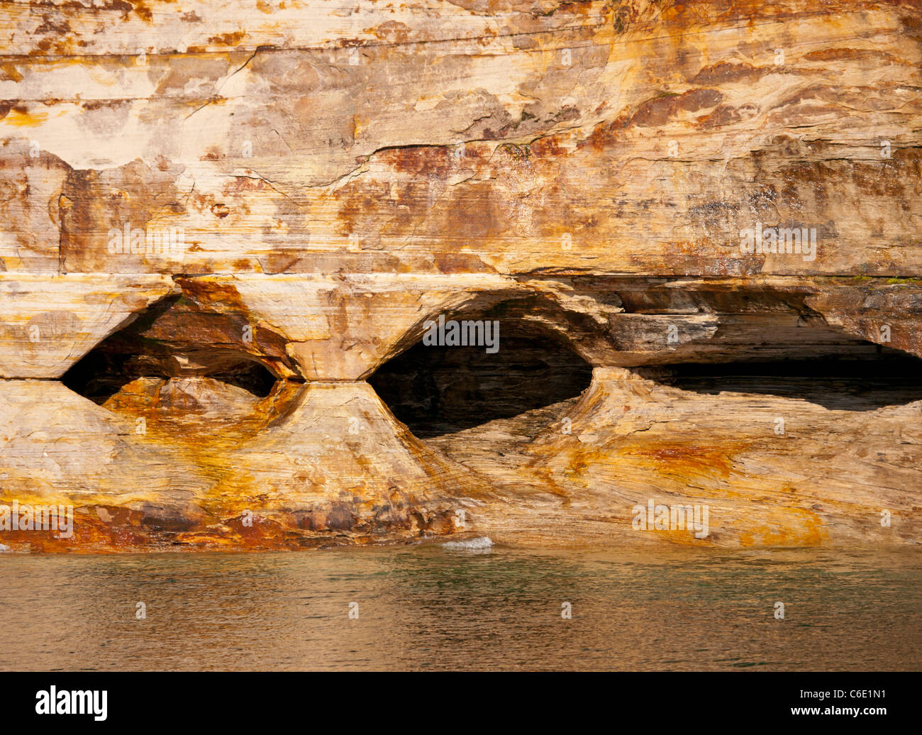 Michigan's Pictured Rocks beautifully colored cliffs has many caves ...