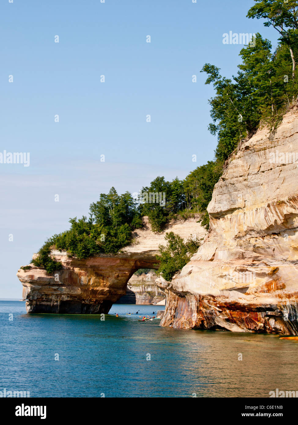 Michigan's Pictured Rocks has streaks on the face of the cliffs that ...