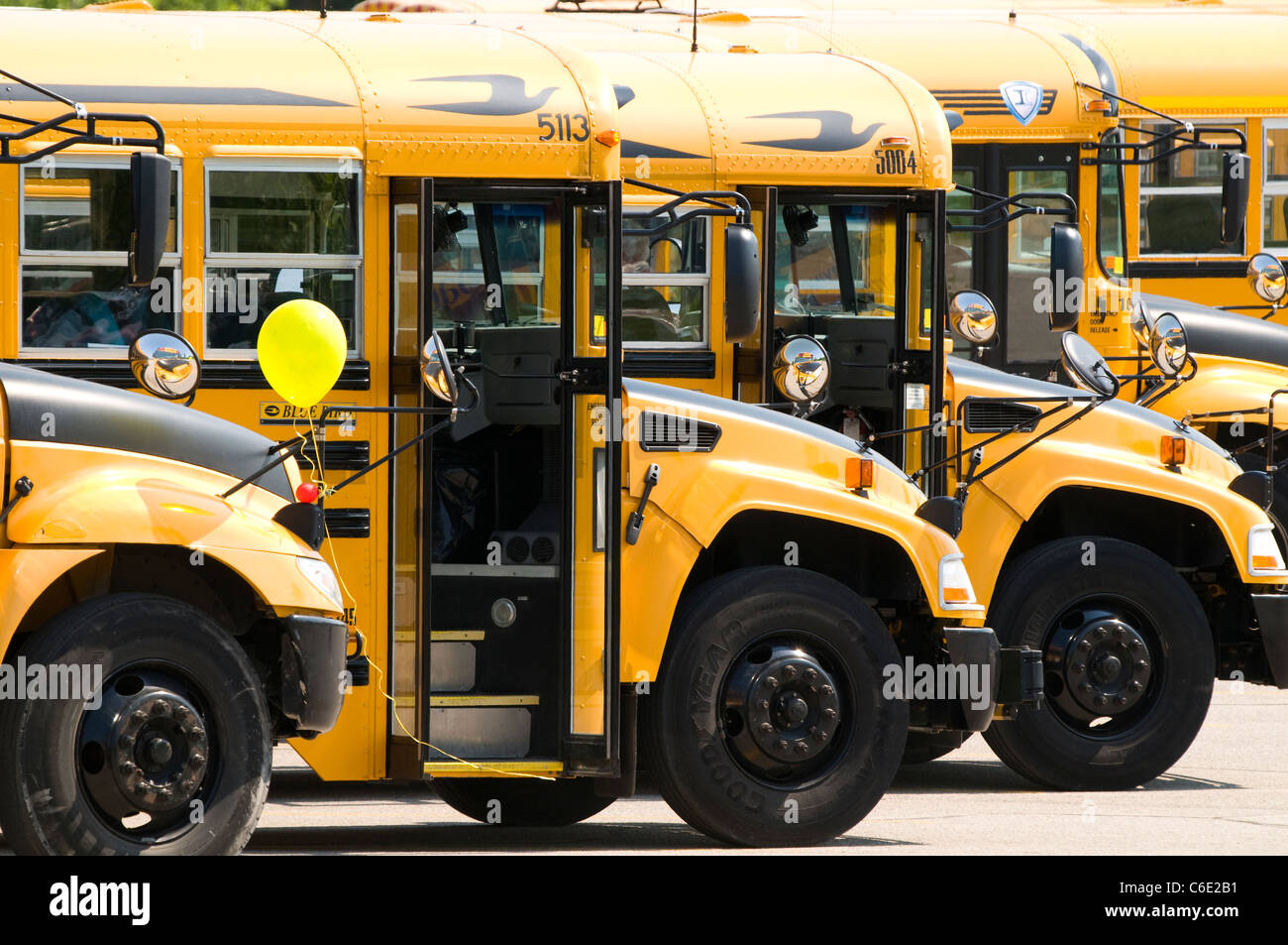 School buses line up hi-res stock photography and images - Alamy