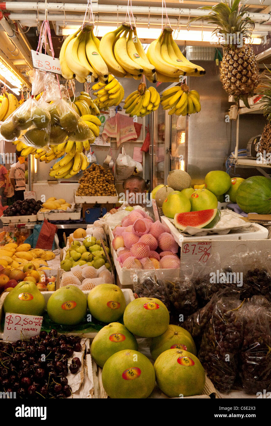 A Fruit stall and storekeeper, the indoor tekka centre market, Little ...
