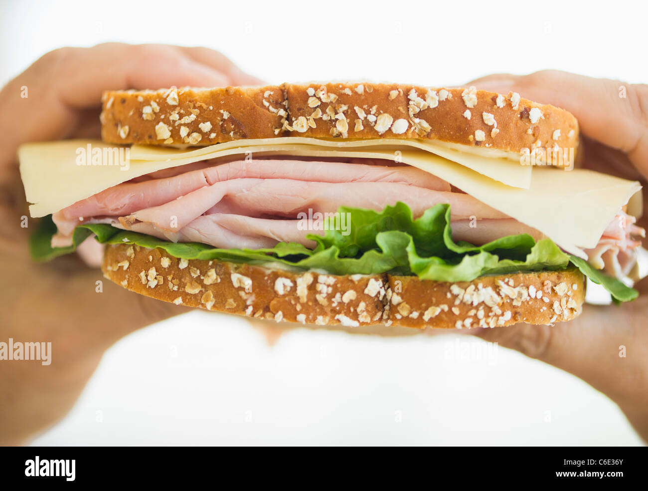 Hand holding sandwich turkey hi-res stock photography and images - Alamy