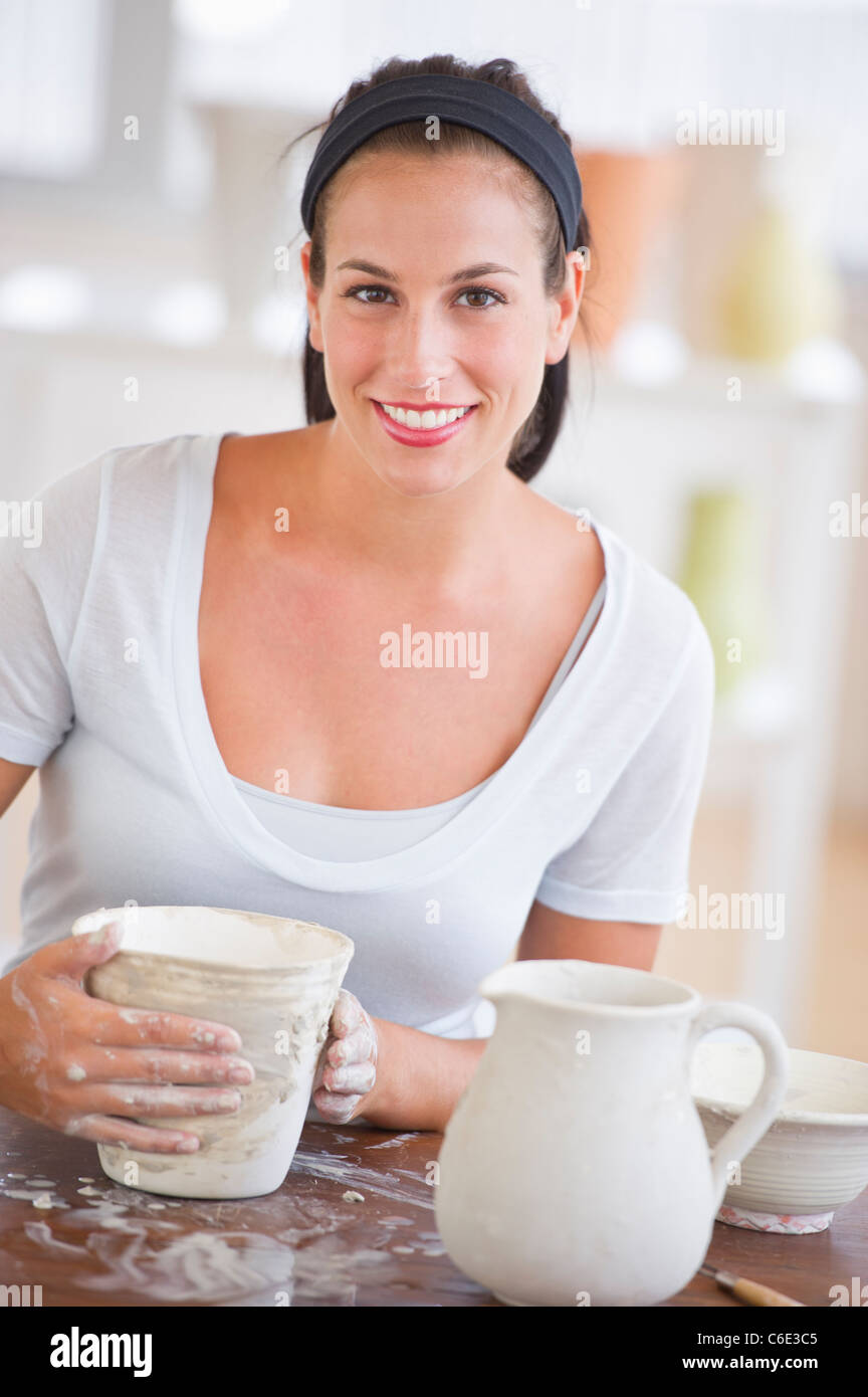 Skillful young woman making hi-res stock photography and images - Alamy