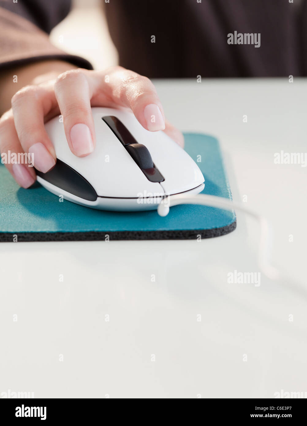 USA, New Jersey, Jersey City, Close up of woman's hand using computer ...