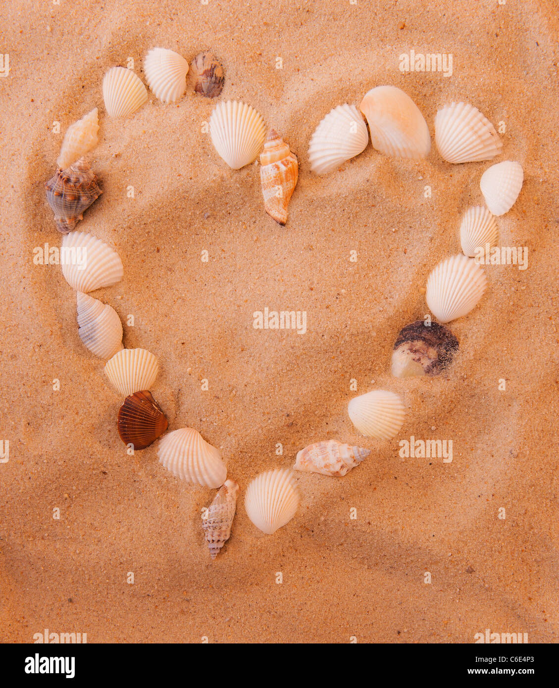 Heart made shells on beach hi-res stock photography and images - Alamy