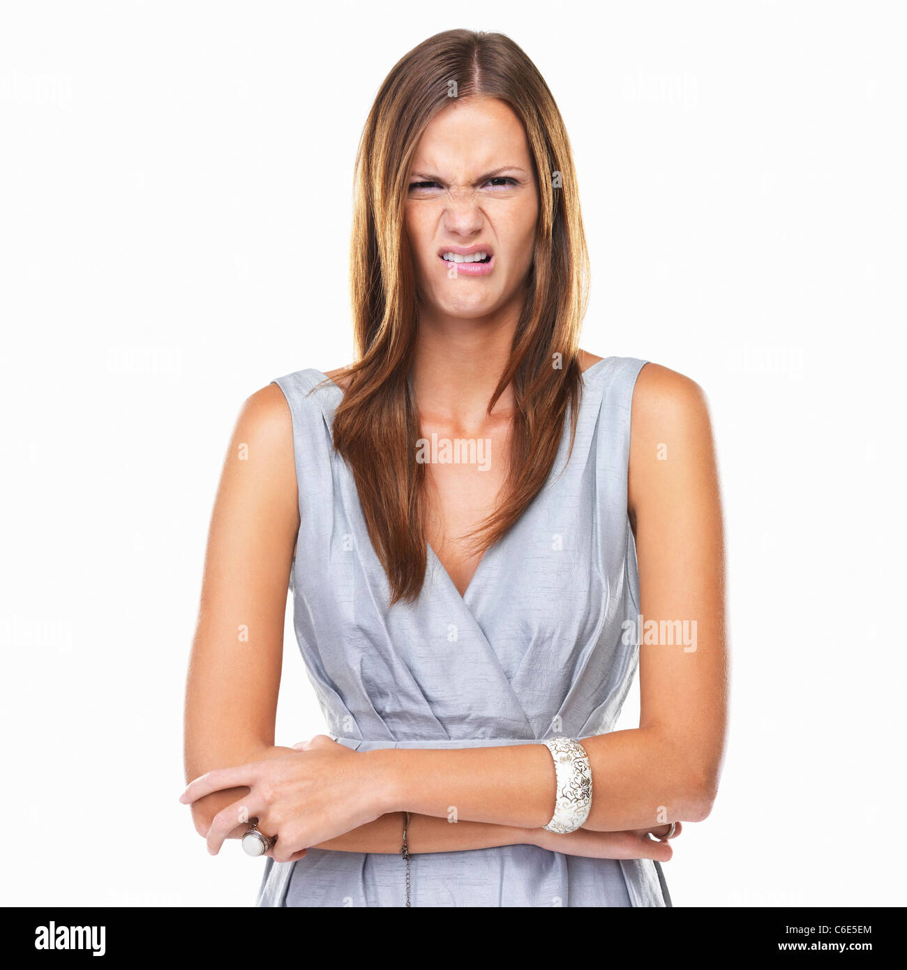 Studio portrait of elegant woman with disgusted expression Stock Photo ...