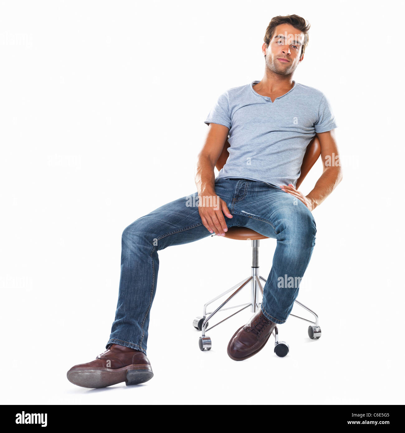 Portrait young confident man sitting Cut Out Stock Images & Pictures ...