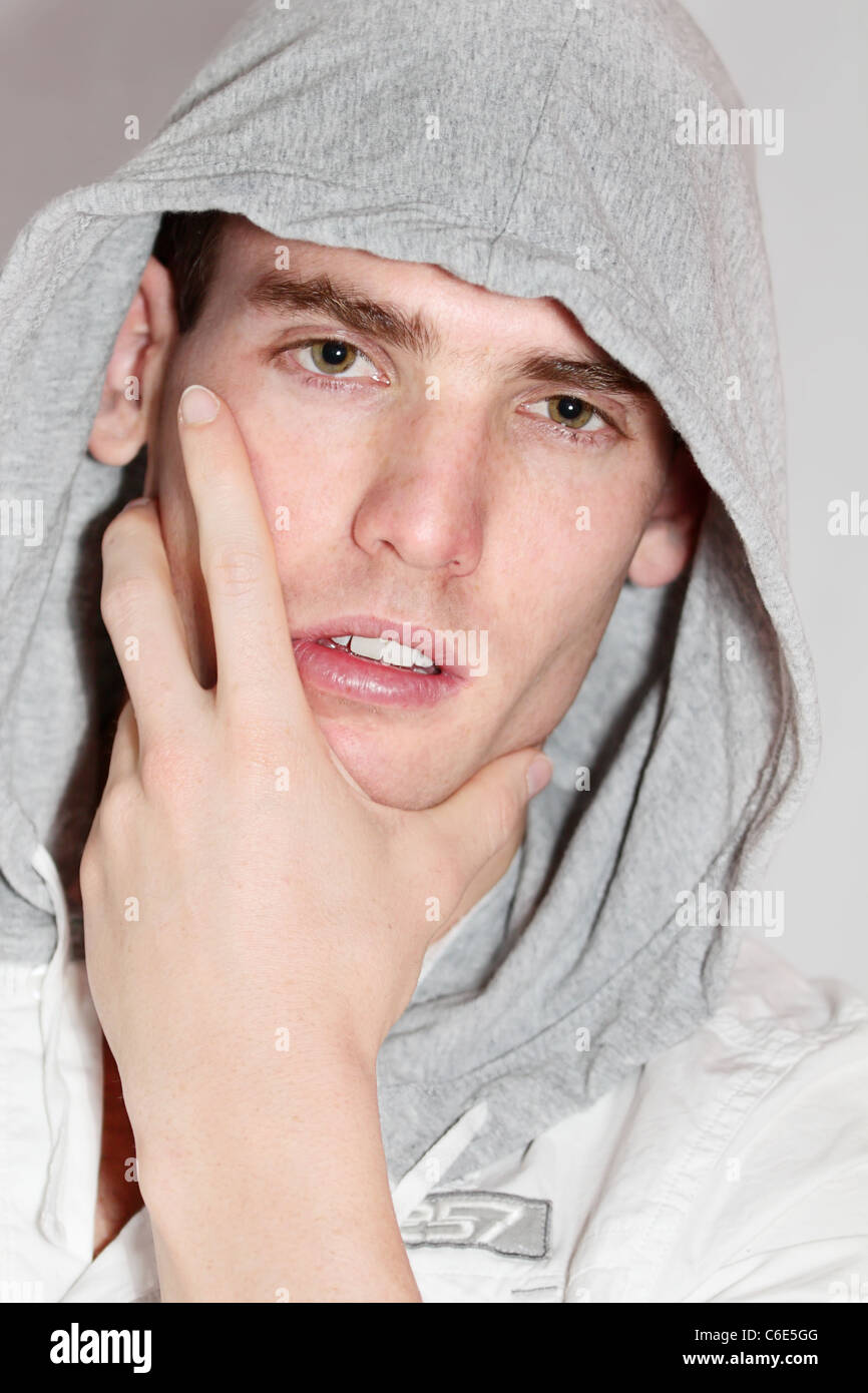 Mysterious Looking Young Man Stock Photo - Alamy