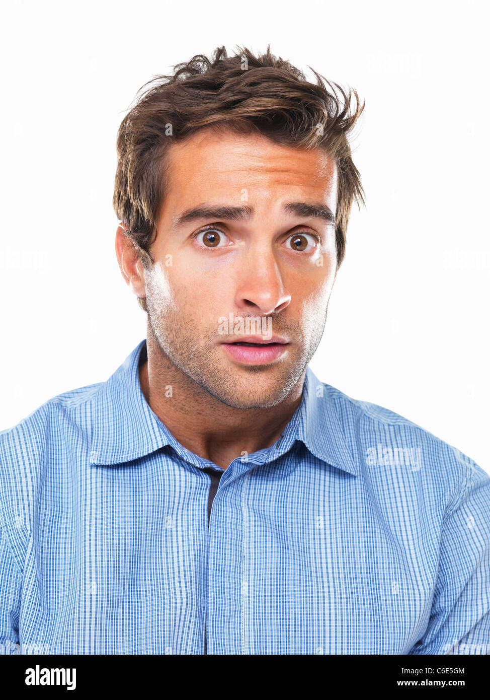 Studio portrait of young of shocked business man Stock Photo - Alamy