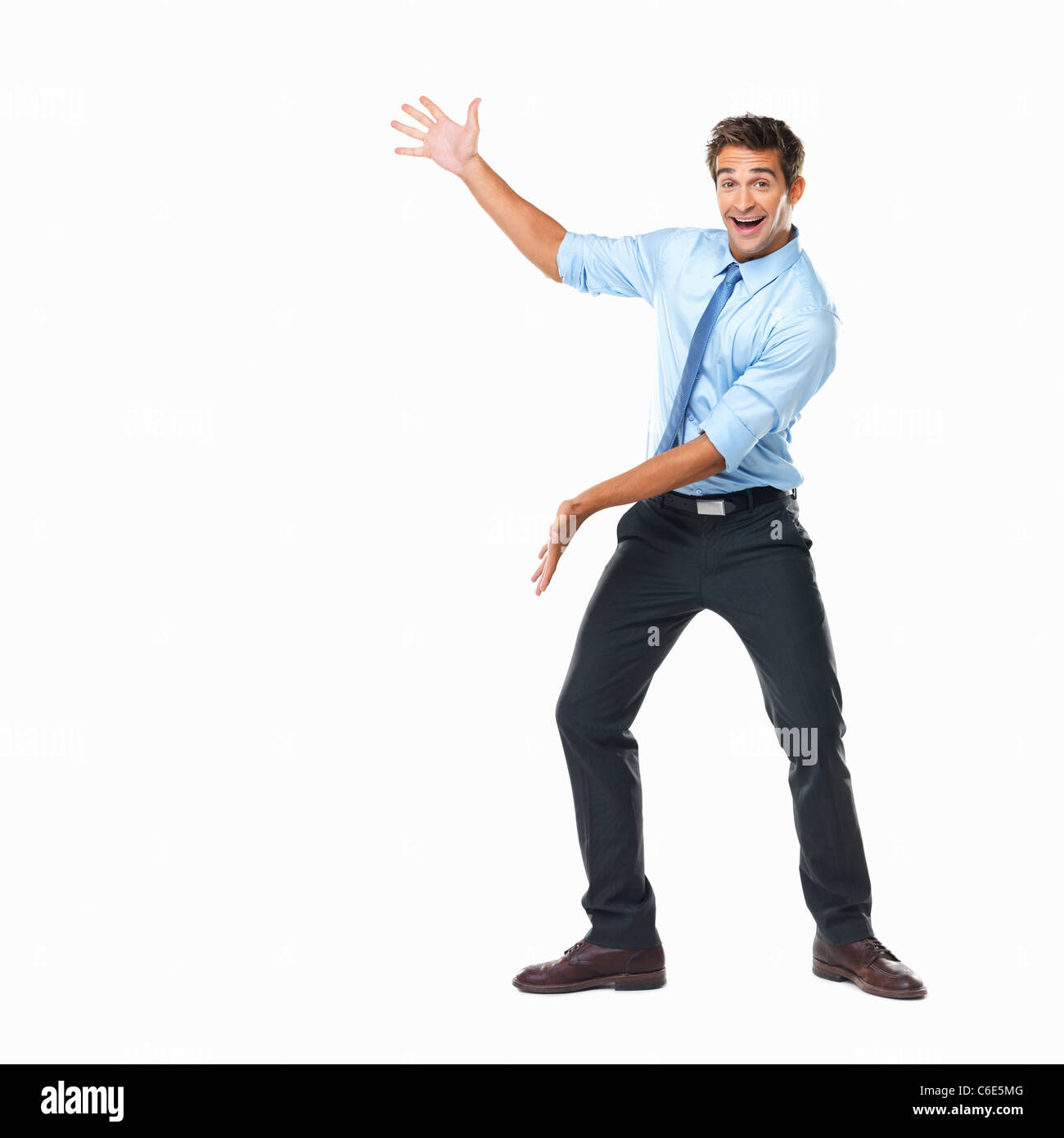 Studio shot of energetic business man giving presentation Stock Photo ...