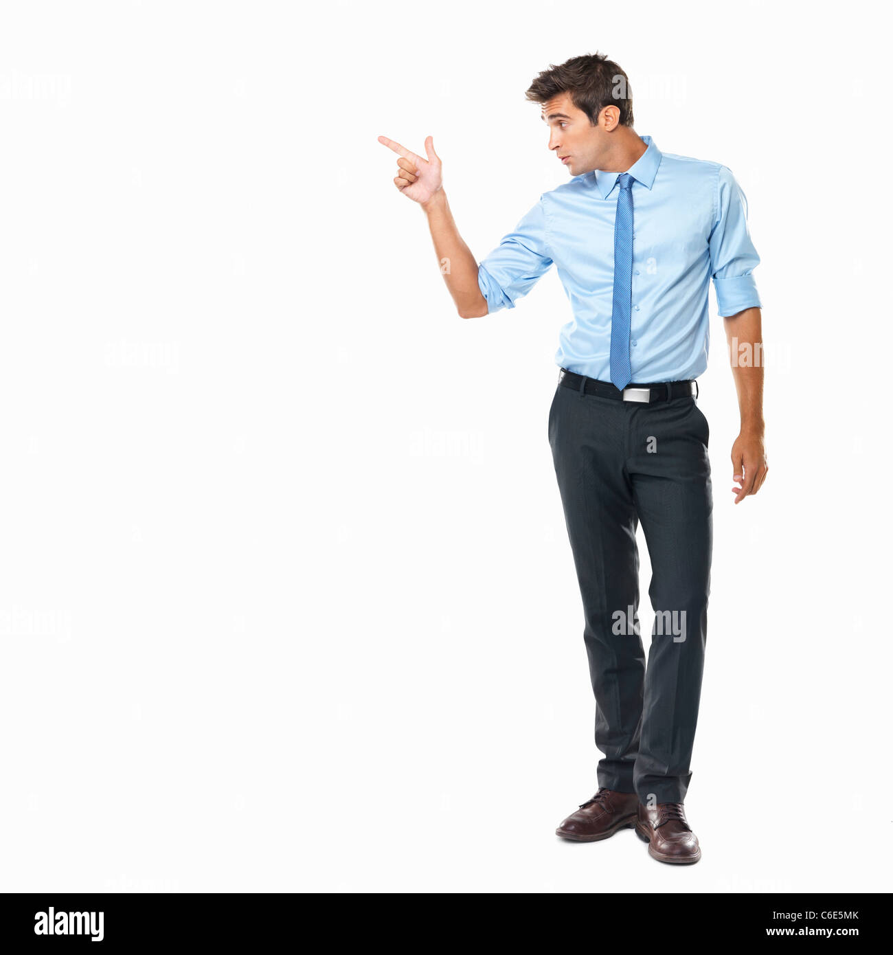 An image of a handsome business man pointing Stock Photo - Alamy