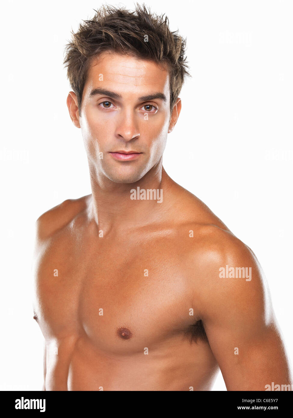 Studio portrait of young muscular man Stock Photo - Alamy