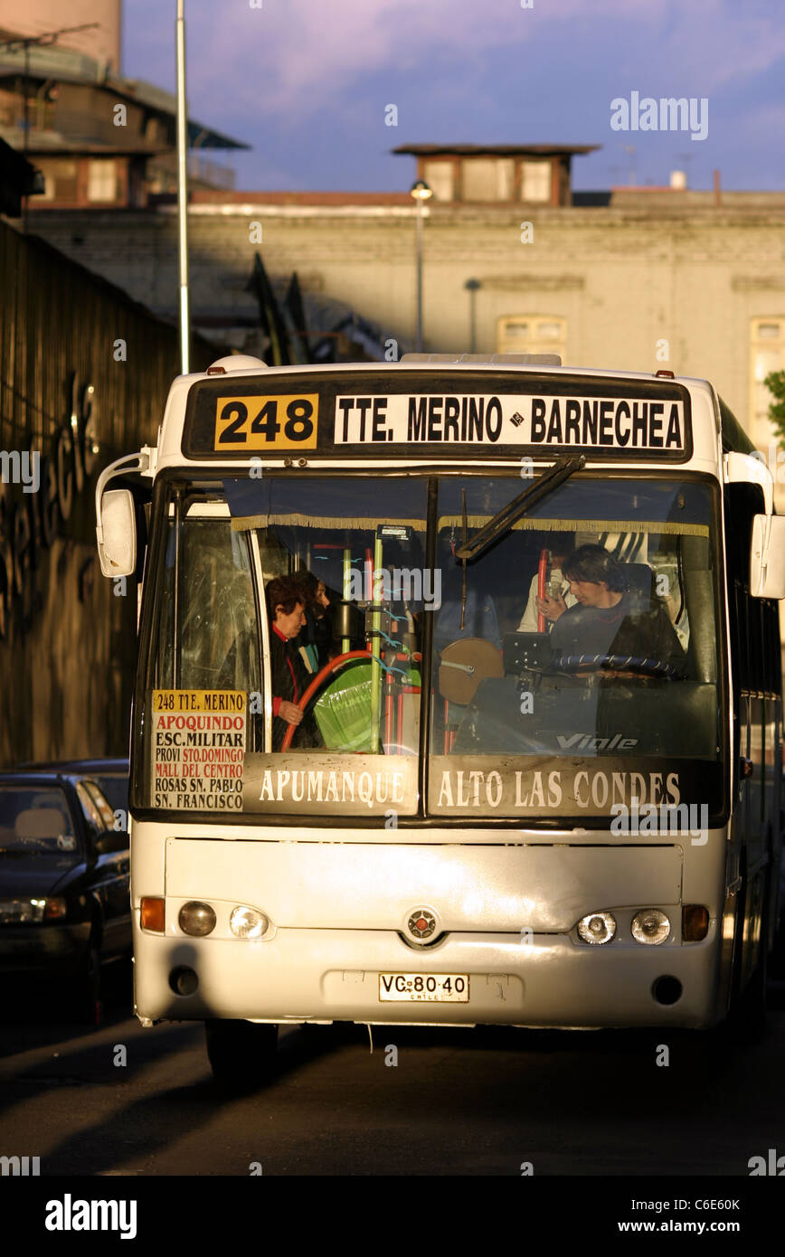 Public bus stopping to pick up passengers on Avenida Rosas in the city ...