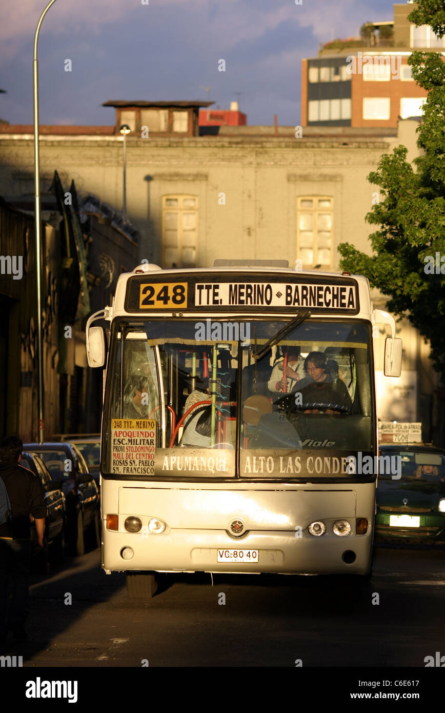 Public bus stopping to pick up passengers on Avenida Rosas in the city ...