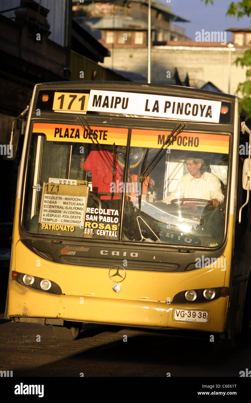 Public bus stopping to pick up passengers on Avenida Rosas in the city ...