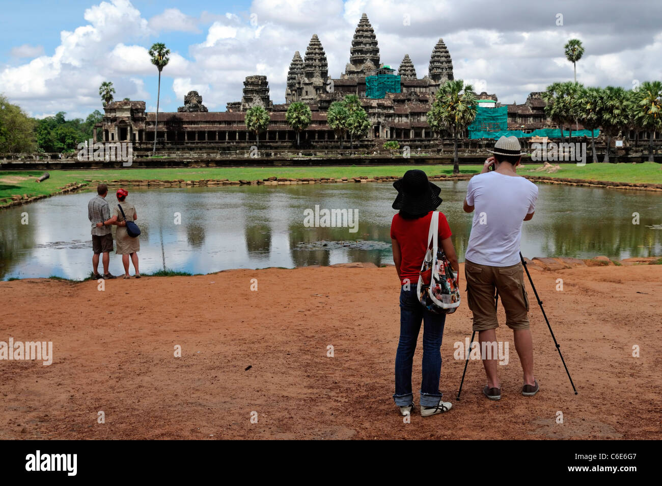 Angkor wat temple complex tourists photograph photo photography admire ...