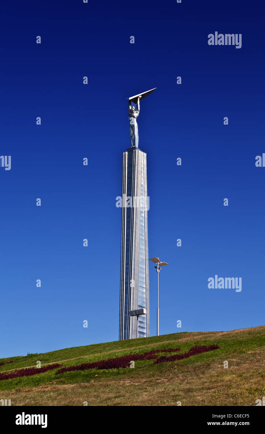 Stela with statue of man holding wings. Samara symbol. Russia Stock ...