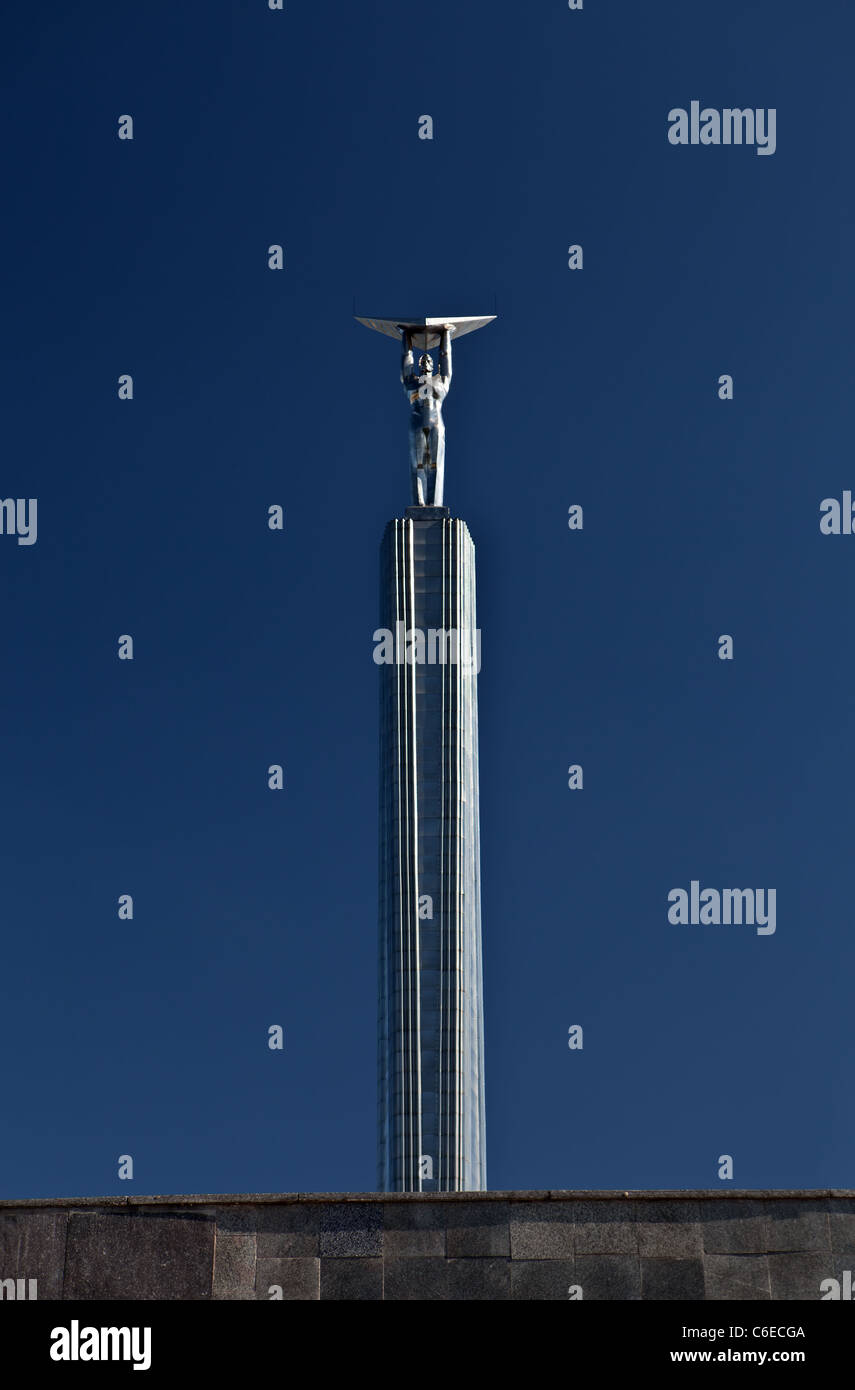 Stela with statue of man holding wings. Samara symbol. Russia Stock ...