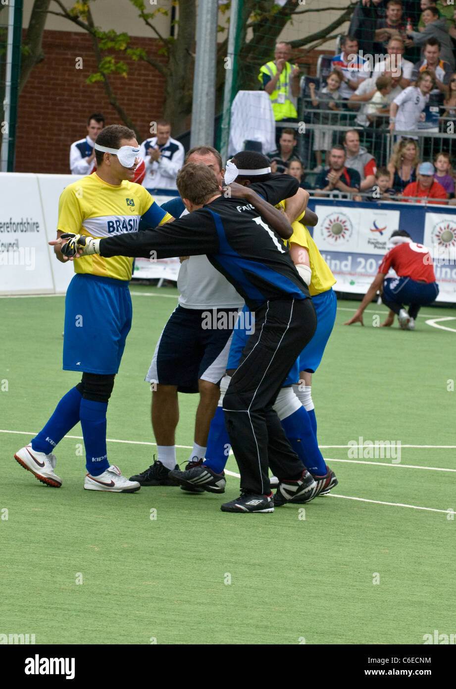 The Brazilian Blind football team celebrate their first goal the final ...