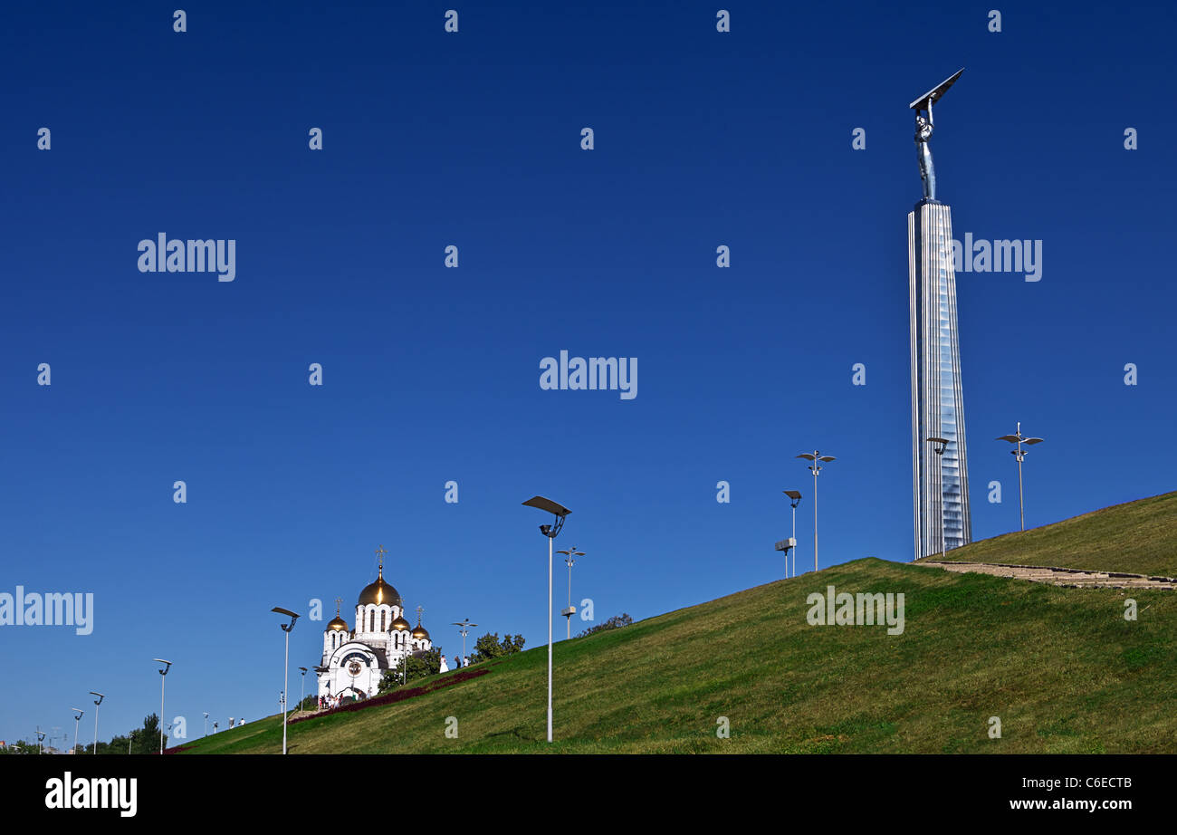 Stela with statue of man holding wings. Samara symbol. Russia Stock ...