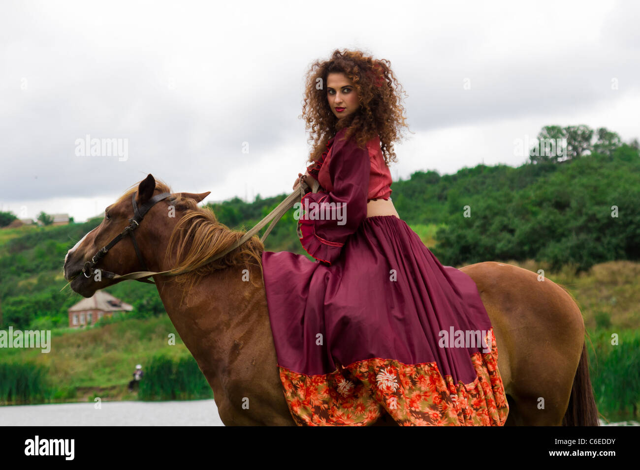 Beautiful gypsy girl riding horse hi-res stock photography and images ...