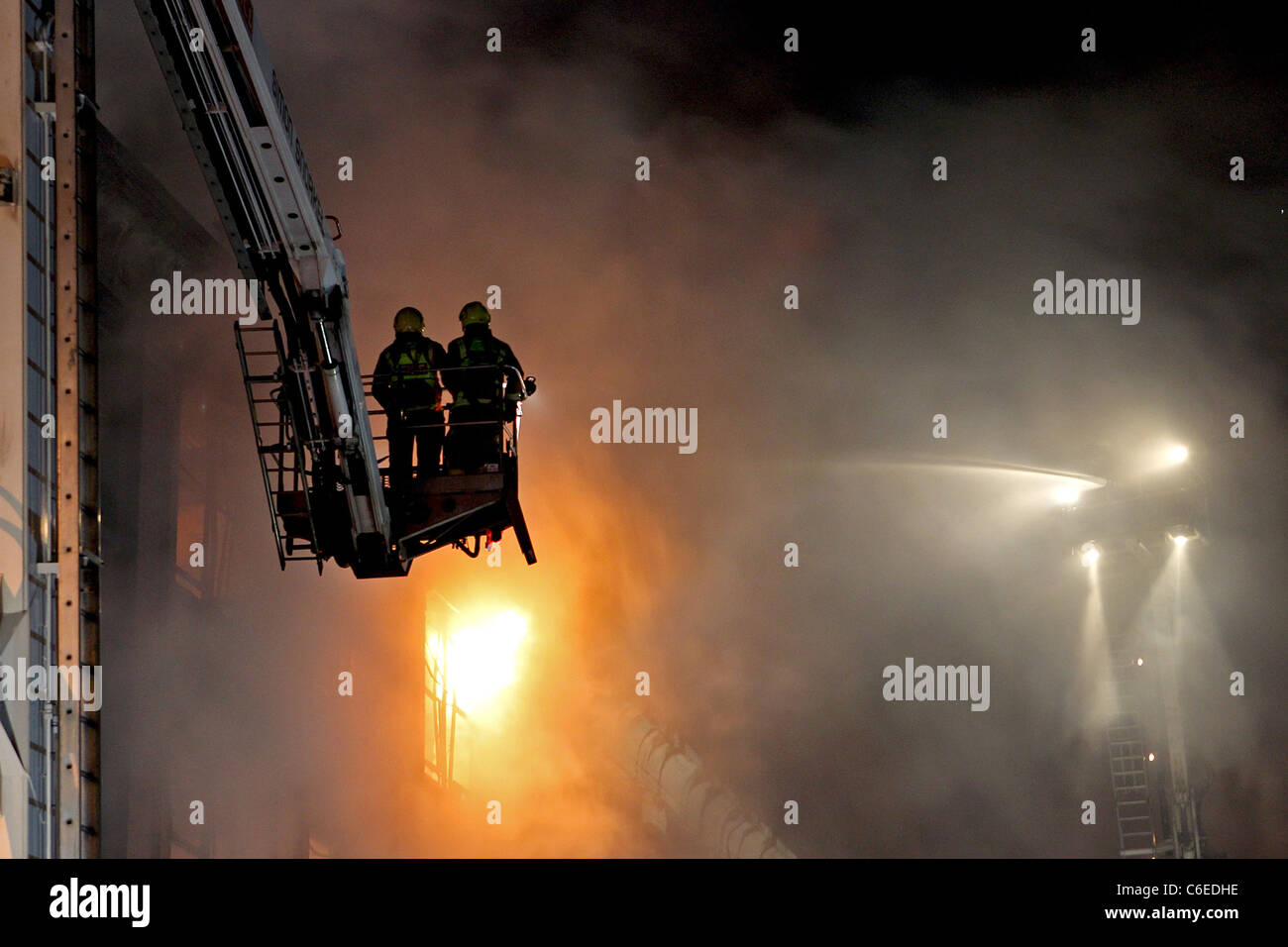 Fireman at works hi-res stock photography and images - Alamy
