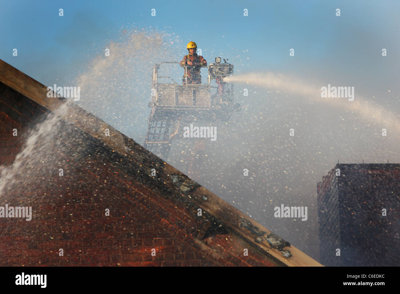 Fire Fighters working on the Factory Fire at Stuart Crystal Factory in ...