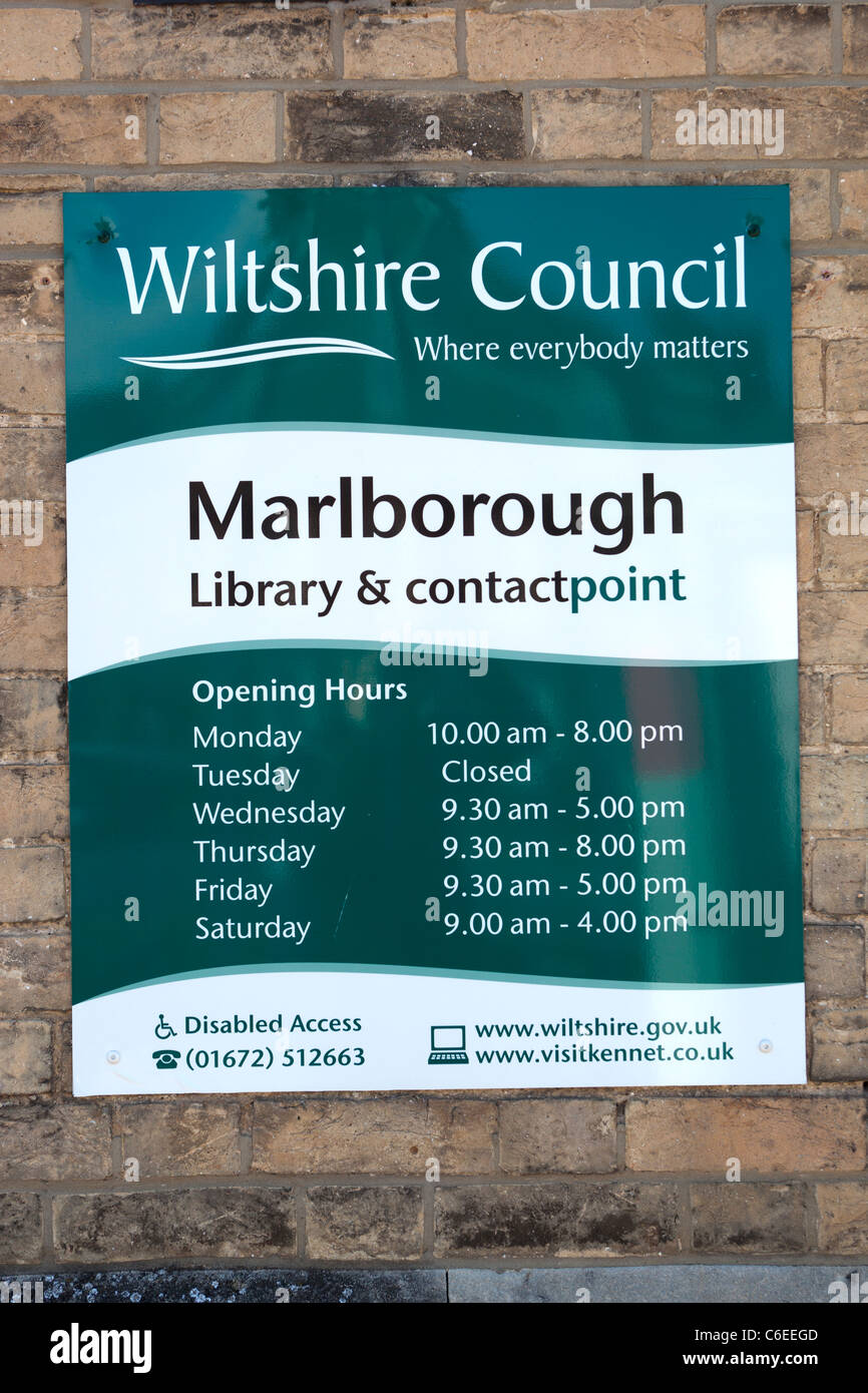 Opening Times Sign outside the Library Marlborough Stock Photo - Alamy