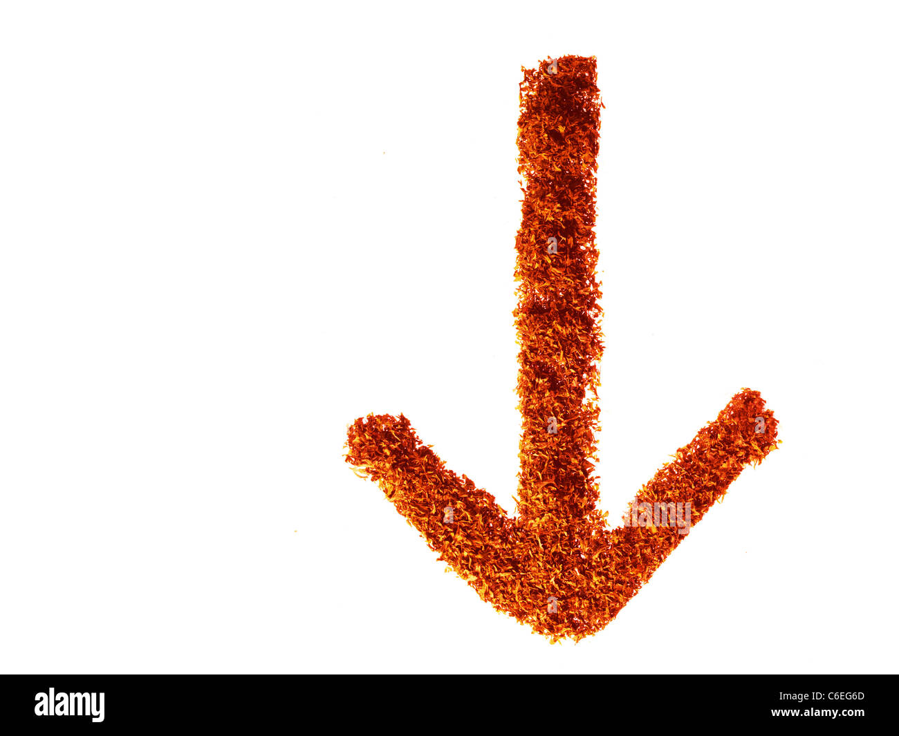 Studio shot of Red Chili Powder making arrow sign on white background ...