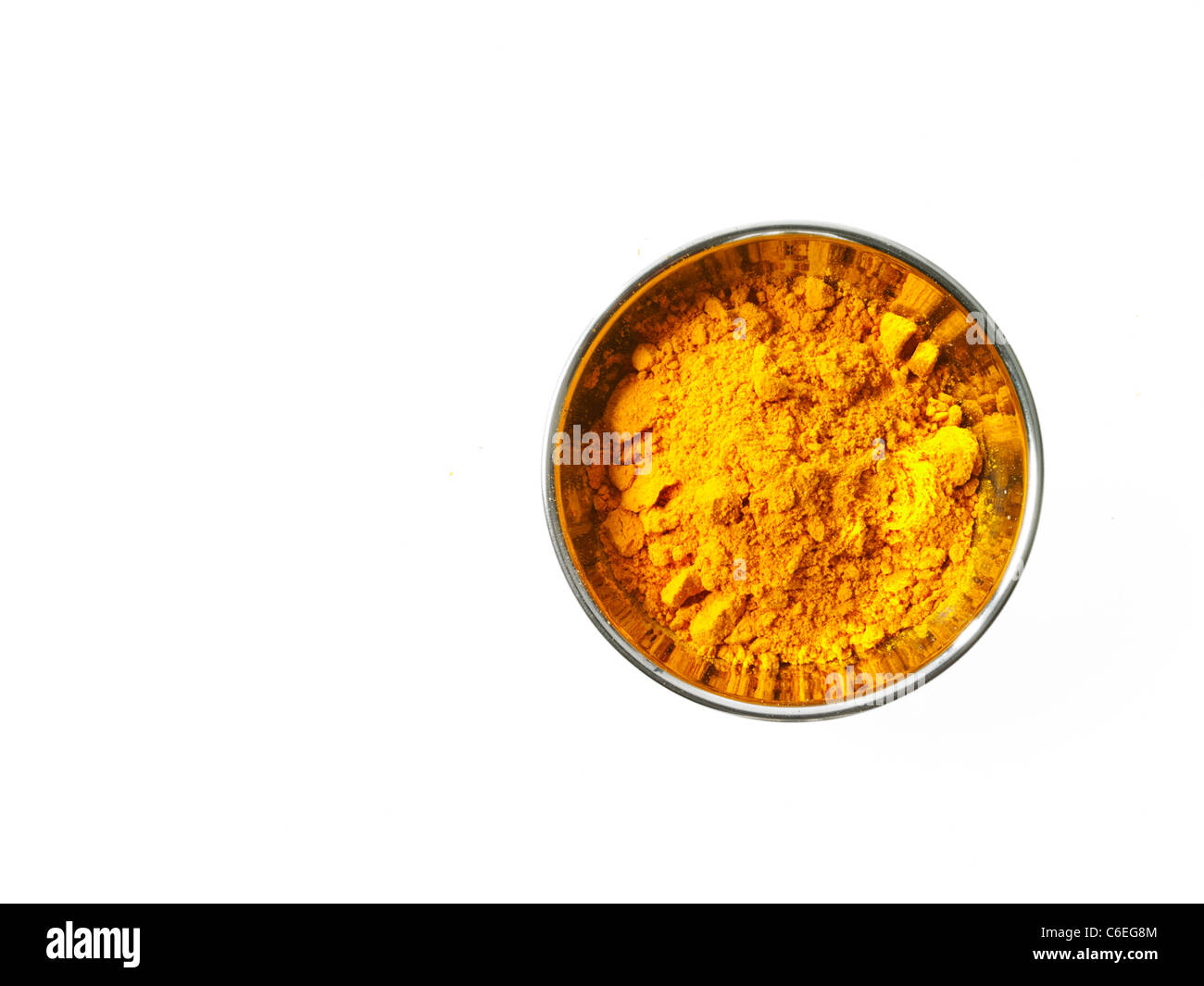 Studio shot of Curry Powder in pan on white background Stock Photo - Alamy