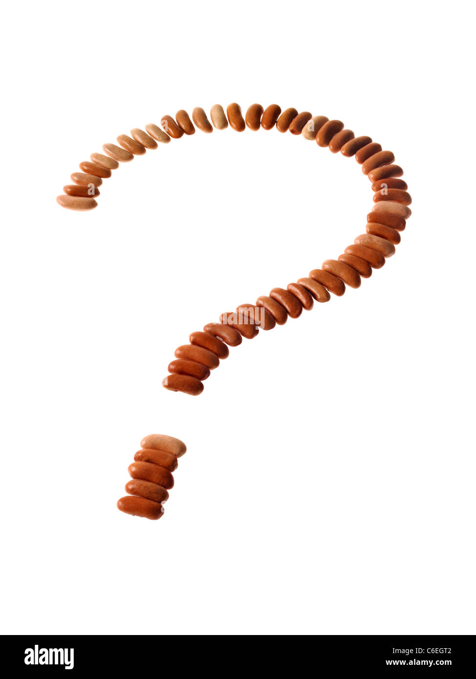 Studio shot of Bean Seeds making Question Mark on white background ...