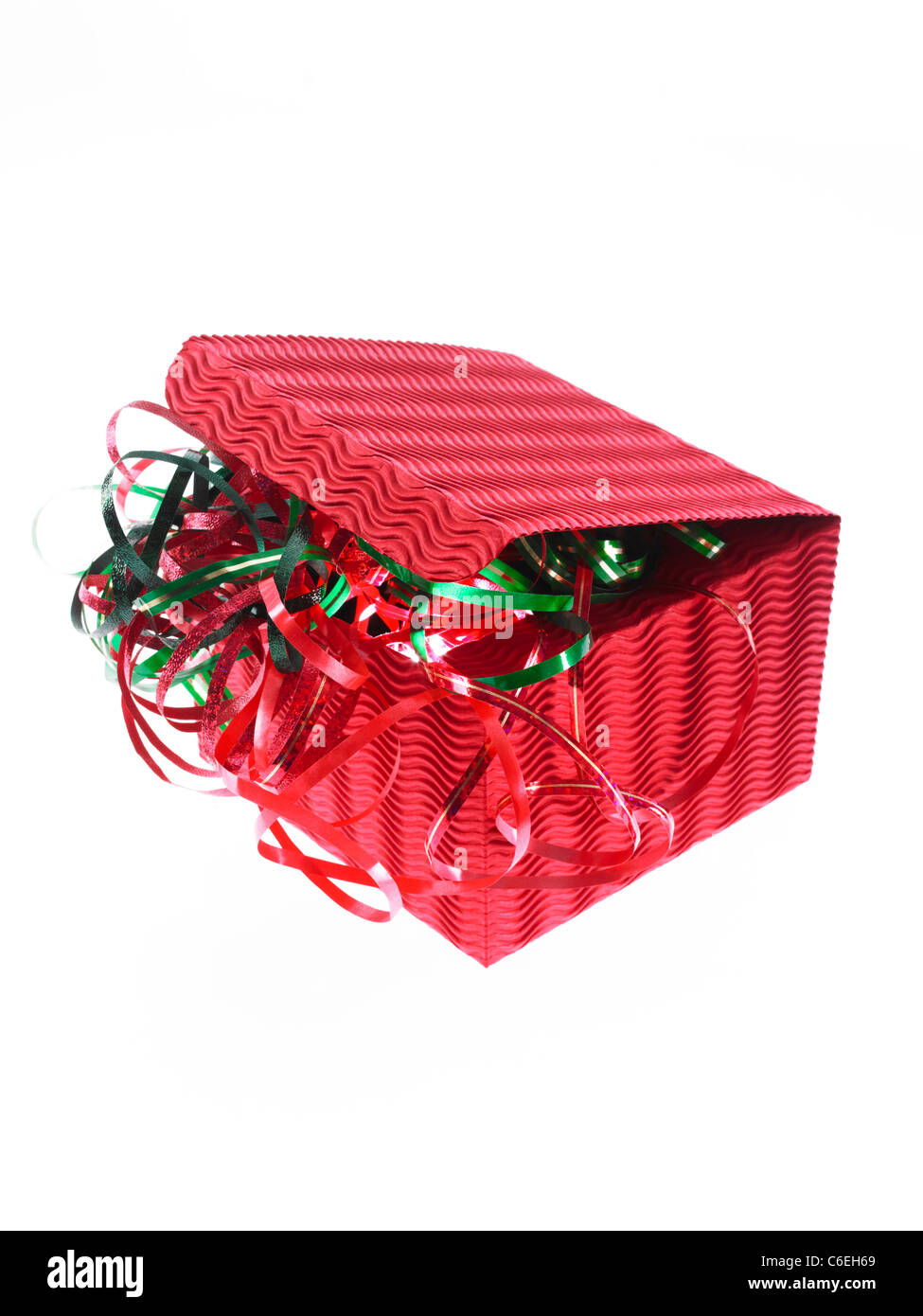 Studio shot of Red and Green Ribbon and Red Box on white background ...