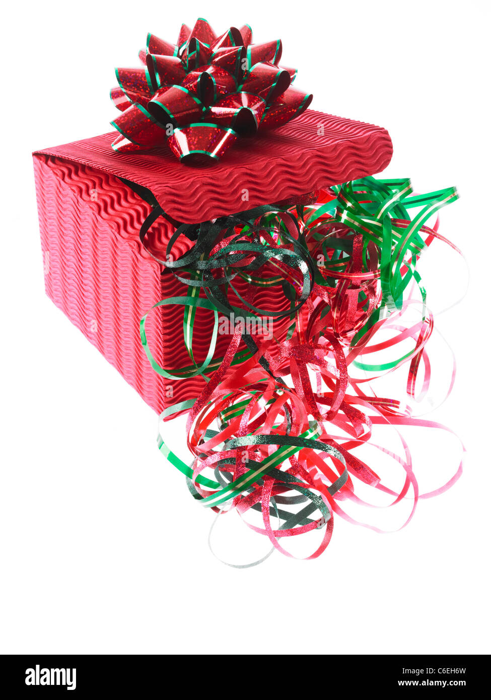 Studio shot of Red and Green Ribbon and Red Box on white background ...
